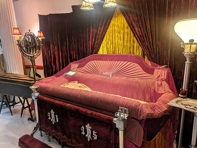 This plush-lined casket with its rich burgundy velvet interior shows how Victorians approached death with both dignity and dramatic flair.