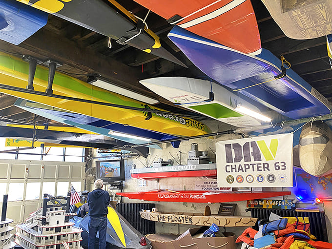 Look up! The museum's ceiling showcases colorful kayaks and canoes, proving that in this temple of temporary transportation, inspiration comes from all directions.