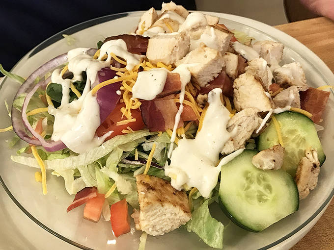A fresh chef salad piled high with crisp vegetables, tender chicken, and shredded cheese &ndash; proof that Charlie's does "light" just as well.