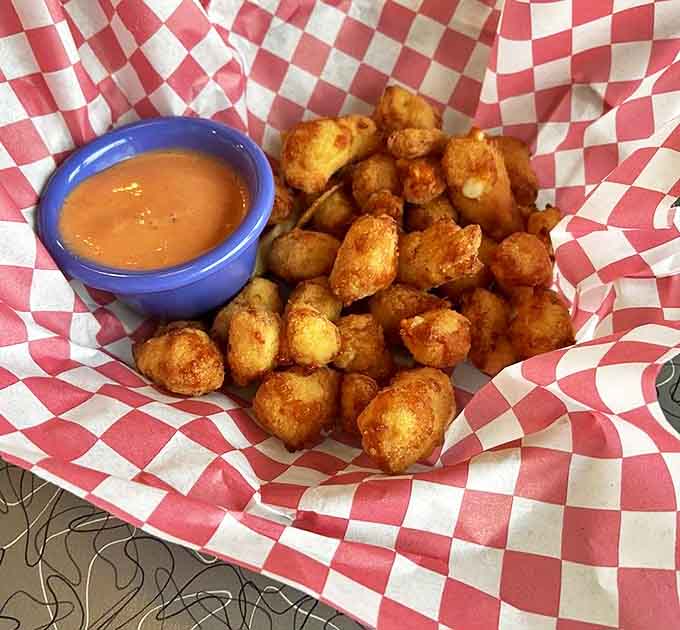 Golden, gooey cheese curds that stretch like rubber bands &ndash; Minnesota's favorite appetizer done right, with a dipping sauce that seals the deal.