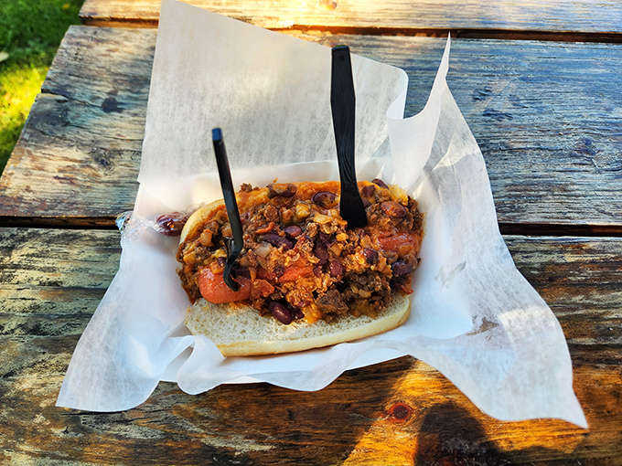 The Rhino Dog doesn't mess around &ndash; loaded with chili, beans, and enough toppings to make you question the structural integrity of the bun.