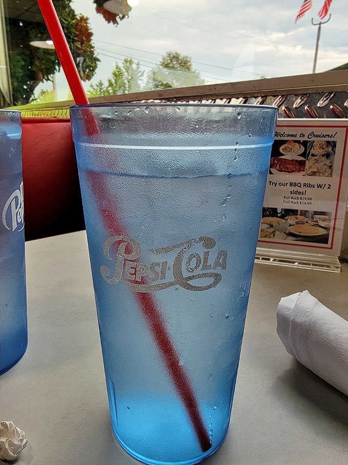 That blue Pepsi glass isn't just holding a drink &ndash; it's cradling liquid nostalgia that tastes better with every sip.
