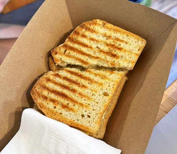 Breakfast architecture at its finest &ndash; a perfectly constructed tower of morning flavors that somehow fits in one hand.