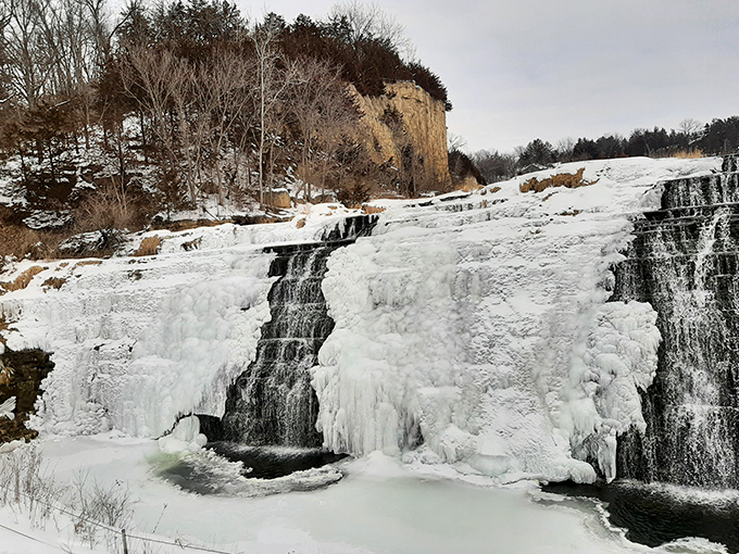 Winter transforms Thunder Bay Falls into a frozen masterpiece that would make Elsa jealous of nature's ice-sculpting skills.