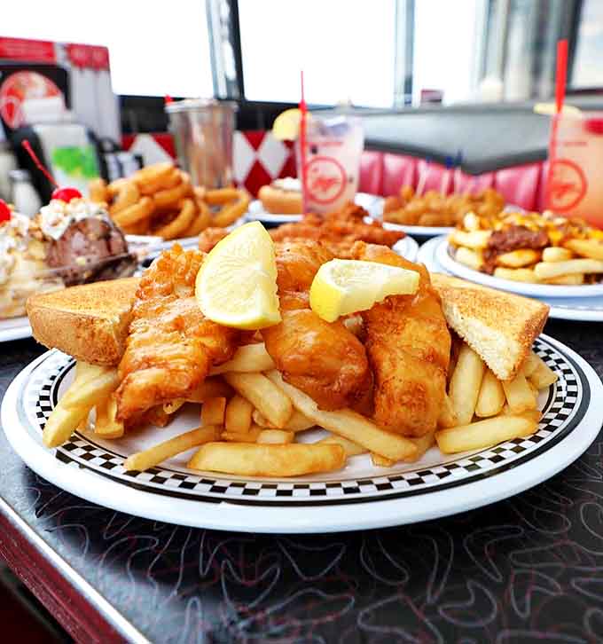 Crispy fish and chips that transport you straight to the seaside, minus the sand in your shoes.