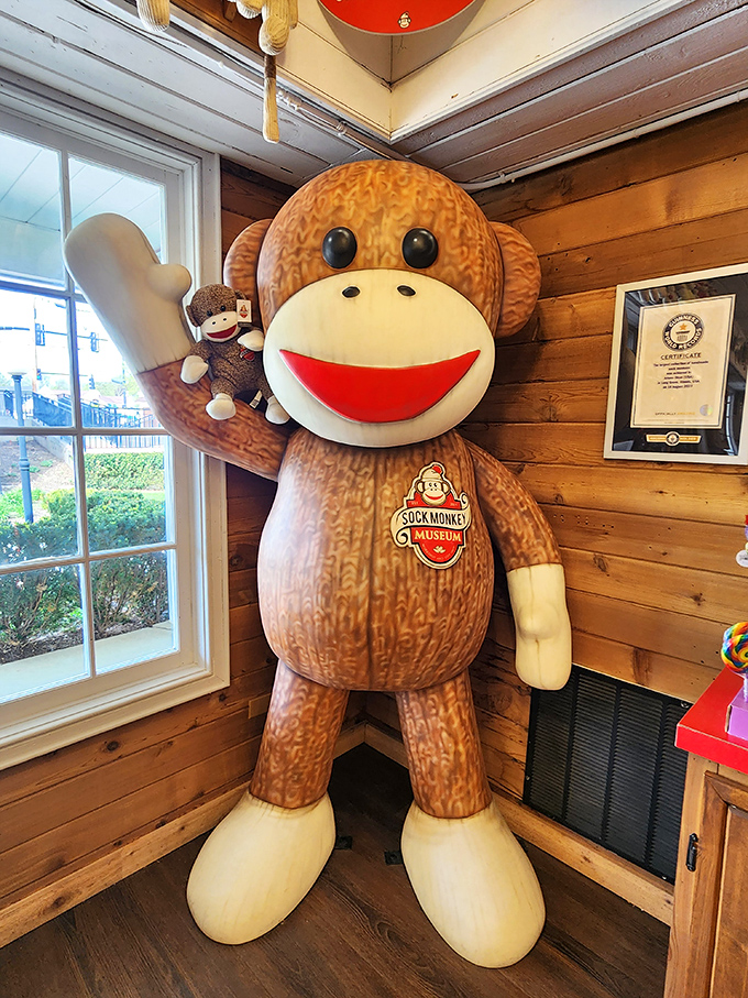 The museum's mascot stands tall, greeting visitors with the iconic red-lipped smile that generations have come to love.