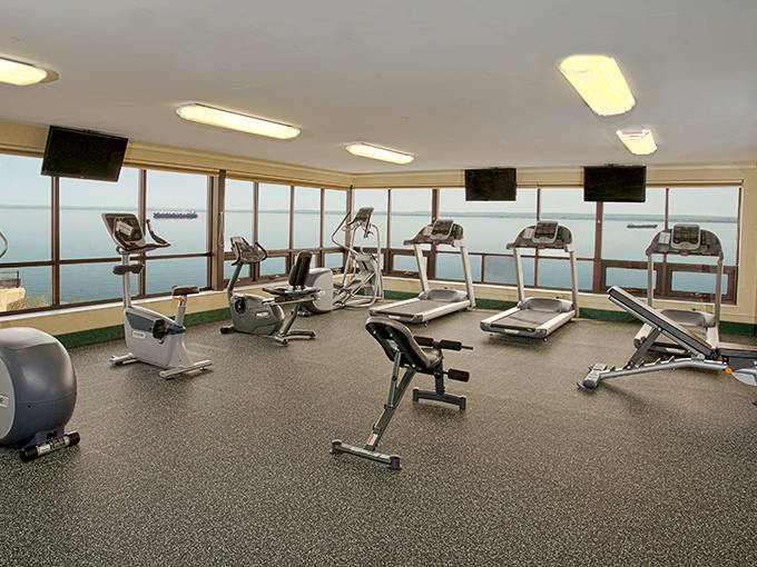 The fitness center transforms mundane workouts into inspirational experiences, with Lake Superior's vastness reminding you there's a world beyond the treadmill.