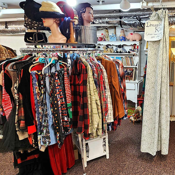 Fashion from another era hangs in suspended animation, each garment whispering secrets of dances attended and occasions celebrated.