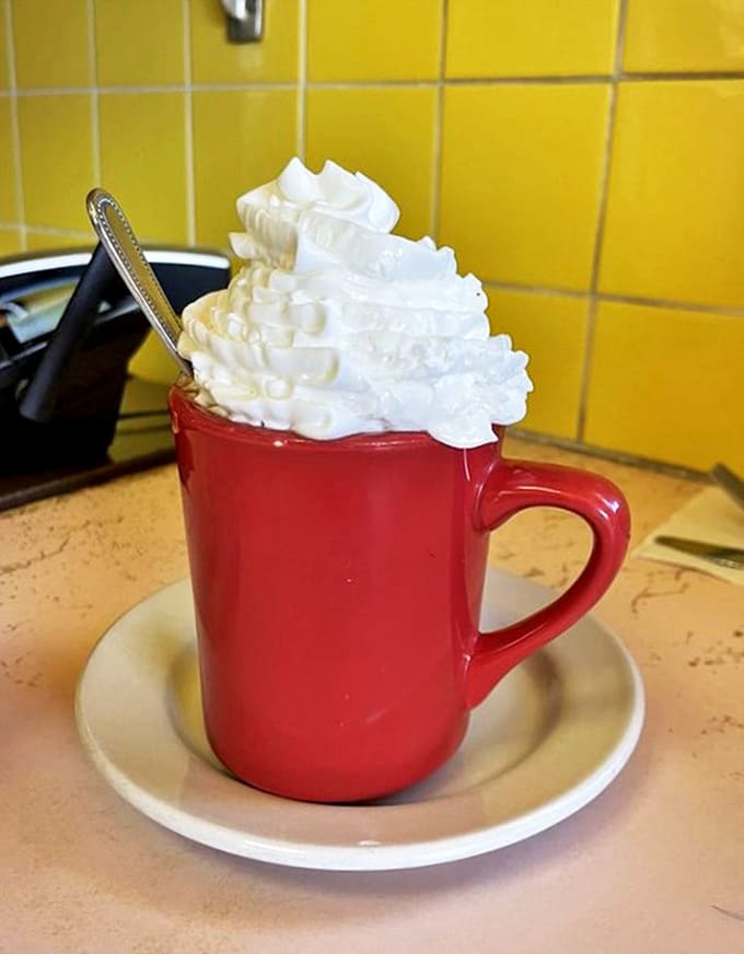 Hot chocolate that doesn't mess around&mdash;a serious mug topped with a cloud of whipped cream that requires strategic sipping techniques.