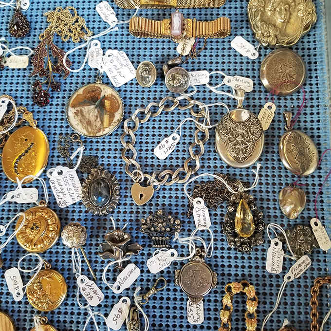 Vintage jewelry gleams under Minnesota sunshine &ndash; each locket, brooch, and charm bracelet holding secrets of previous owners and special occasions.