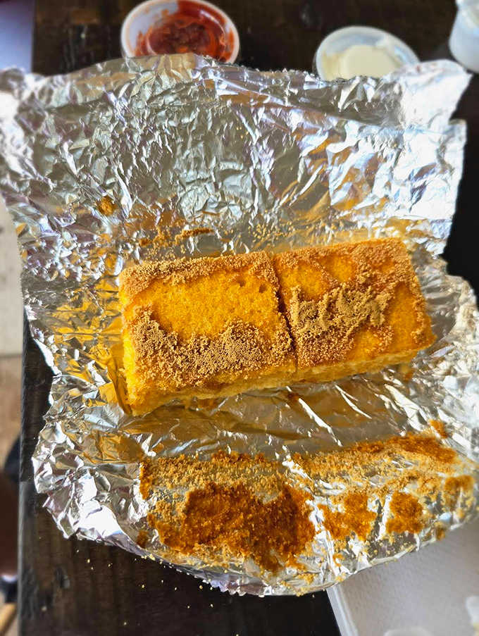 Cornbread wrapped in foil like a delicious gift you're about to give yourself, because you deserve it.