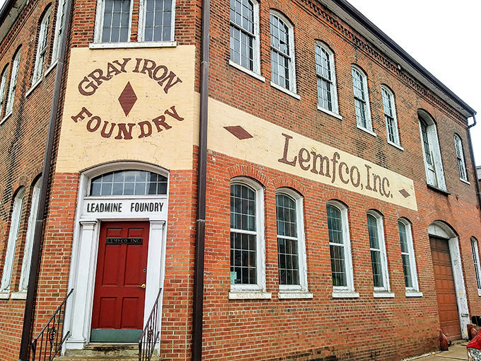 Industrial heritage preserved in brick and mortar, a reminder of the manufacturing prowess that once defined this river town.