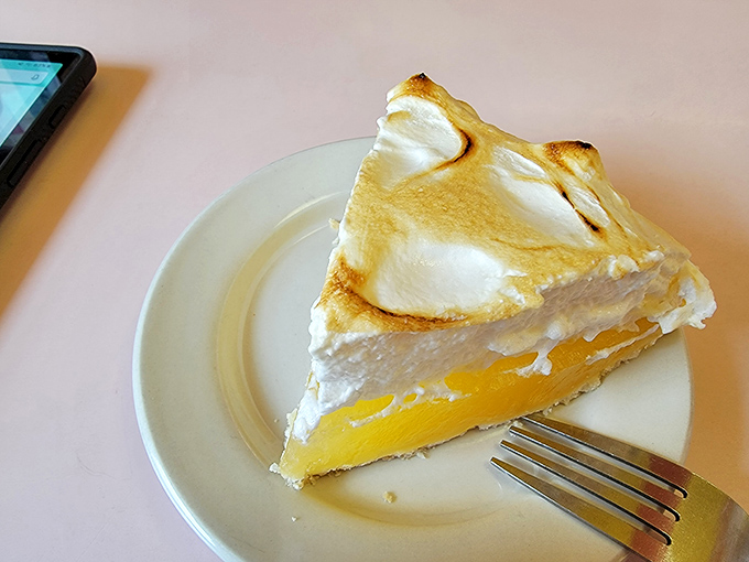 Lemon meringue pie with a cloud of fluffy topping – the exclamation point at the end of a perfect diner meal.