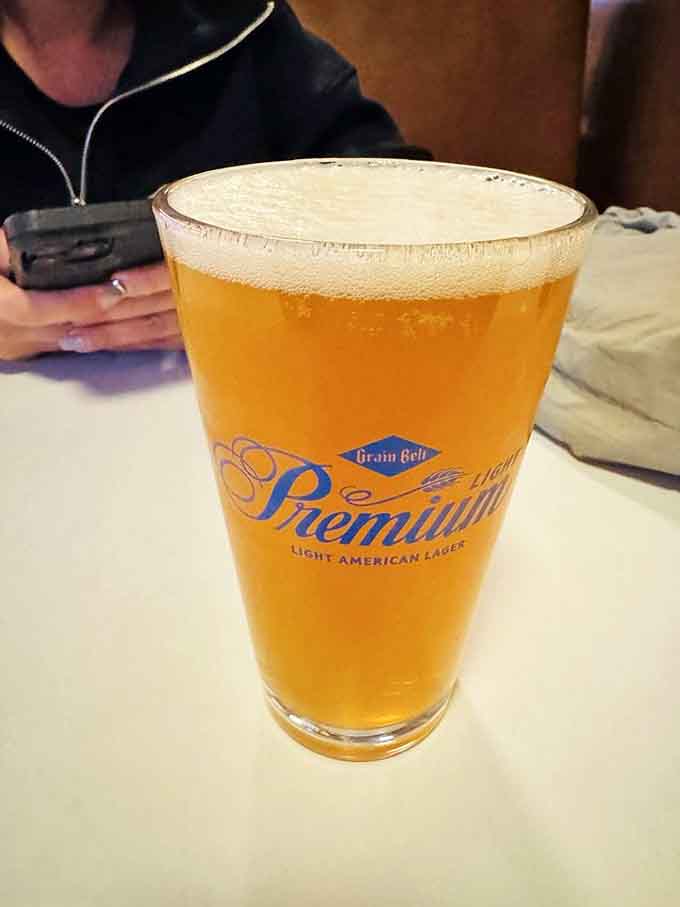 A cold beer and a hot burger create the kind of pairing that makes you believe in a higher power.