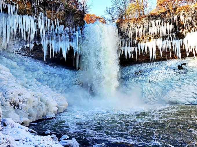 Winter transforms Minnehaha into a frozen fantasy world, with massive ice formations creating a natural sculpture that defies belief.