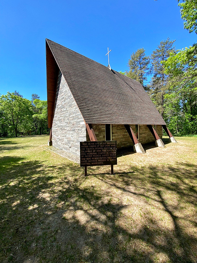 The distinctive A-frame chapel stands as a spiritual landmark, its architecture reaching skyward like a prayer.