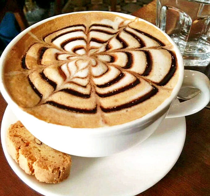 Coffee transformed into a work of art &ndash; the perfect companion for watching the world go by through frost-kissed windows.