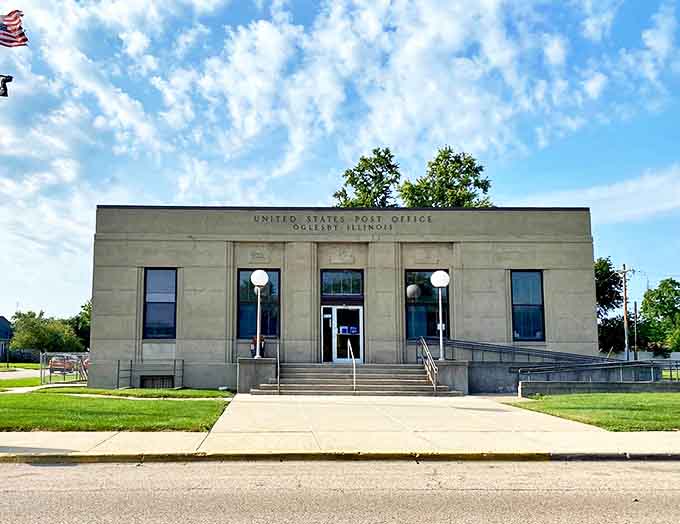 This classic limestone post office building stands as a testament to Oglesby's history, its sturdy presence unchanged while the world rushes by outside.