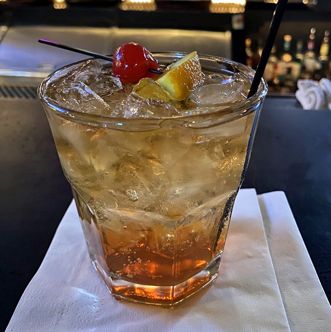 The quintessential Wisconsin old fashioned &ndash; amber liquid over ice with fruit garnish, the perfect prelude to supper club magic.