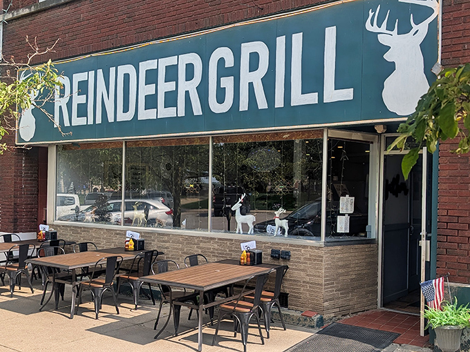 The Reindeer Grill's inviting outdoor seating area beckons pizza lovers to linger over a slice while watching Mansfield life unfold around them.