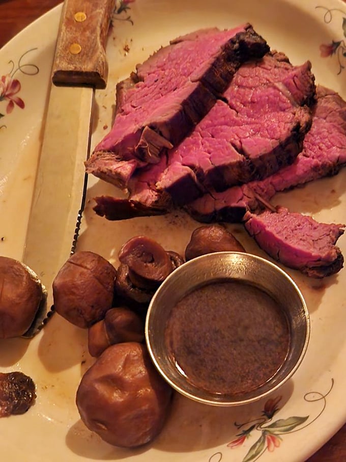 The filet arrives with a perfect sear, those signature marinated mushrooms, and a side of "why haven't I been here before?"