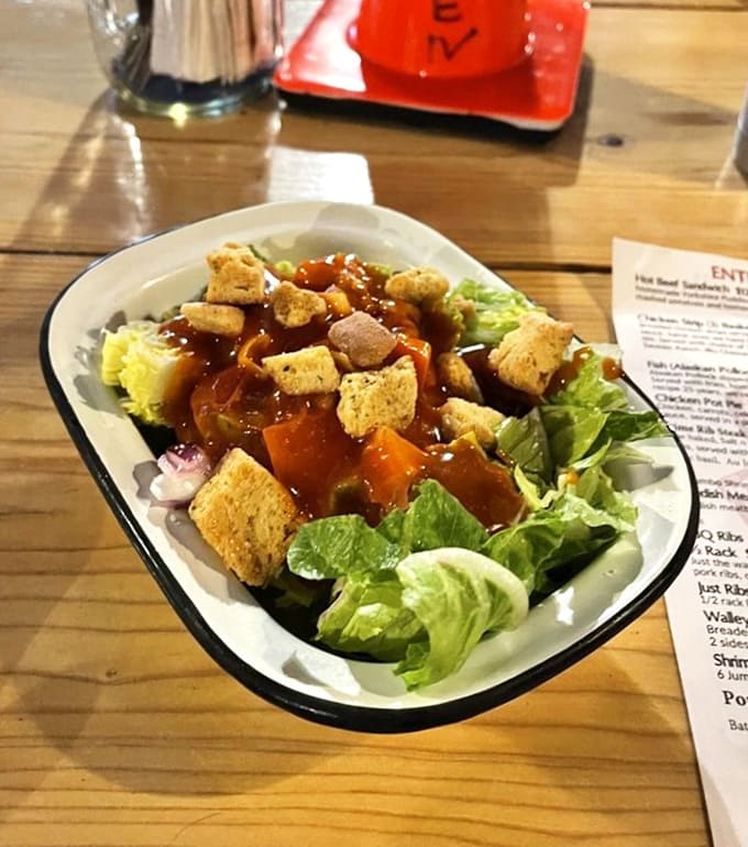 A salad that doesn't apologize for being healthy &ndash; crisp greens and homemade croutons swimming in dressing that means business.