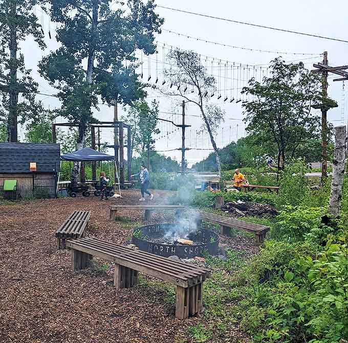 After conquering the heights, the park's rustic fire pit area offers a perfect spot for swapping stories.