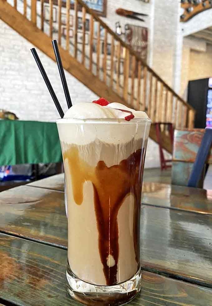 The Shanty Cocktail arrives like a liquid dessert &ndash; layers of caramel and cream create a sweet counterpoint to savory seafood offerings.