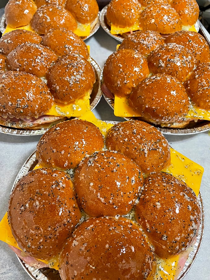 Golden, buttery slider trays loaded with melted cheese and savory fillings &mdash; comfort food ready to share.