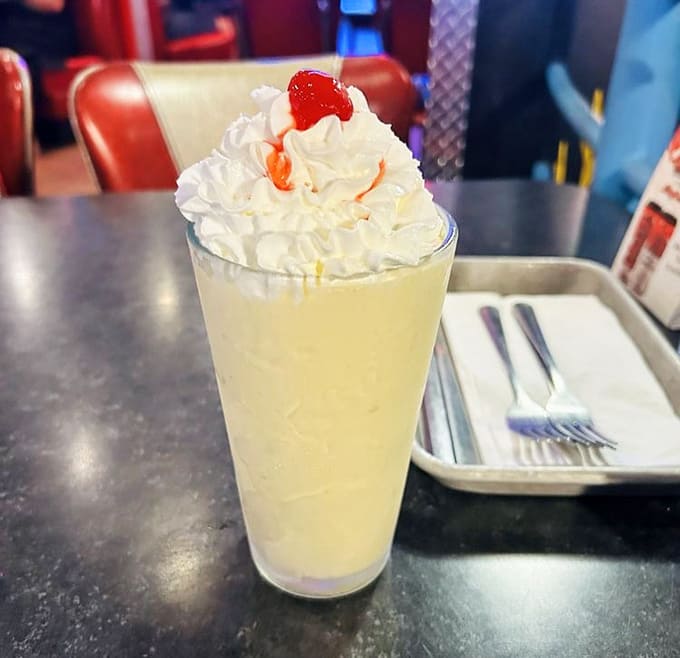 This towering vanilla creation topped with whipped cream and a cherry proves that some dessert traditions are sacred across all known universes.