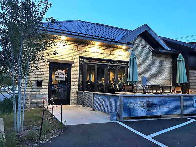 Tanzenwald Brewing Company's modern brick exterior belies the convivial atmosphere inside, where craft beer enthusiasts gather around communal tables.