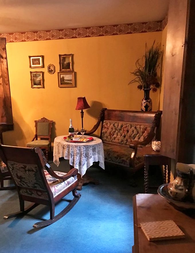 The Shakespeare Room surrounds guests with literary inspiration, its warm yellow walls and antique furnishings creating a scholarly retreat.