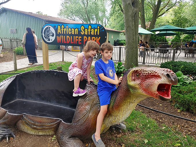 The park's dinosaur statue provides the perfect photo opportunity, blending prehistoric thrills with contemporary family fun.