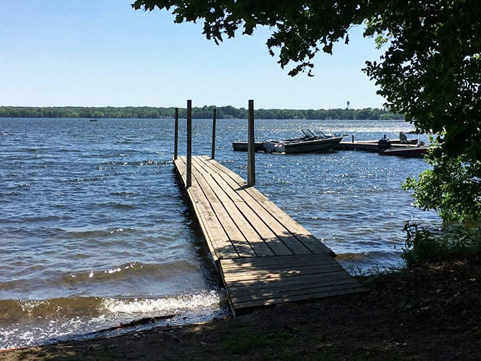 This simple wooden dock extends like an invitation into Mille Lacs Lake, promising adventures for swimmers and boaters alike.