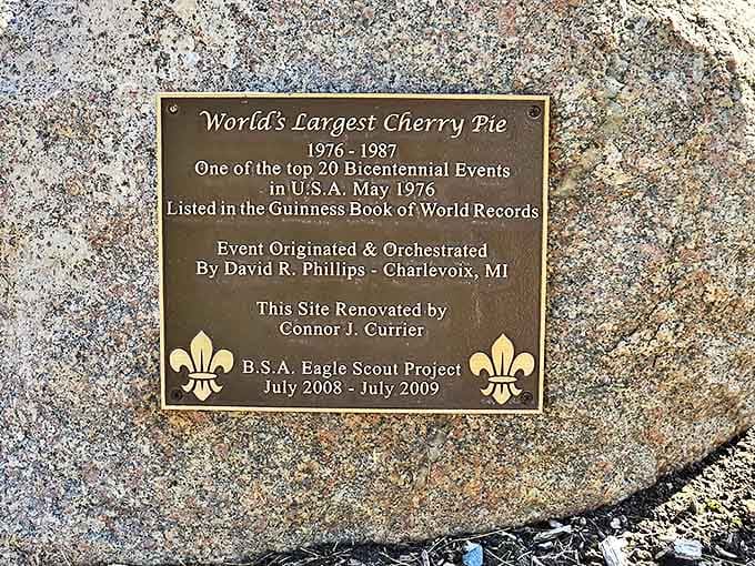 This commemorative plaque reveals the pie's prestigious history as a top Bicentennial Event, later preserved through an Eagle Scout's dedication.
