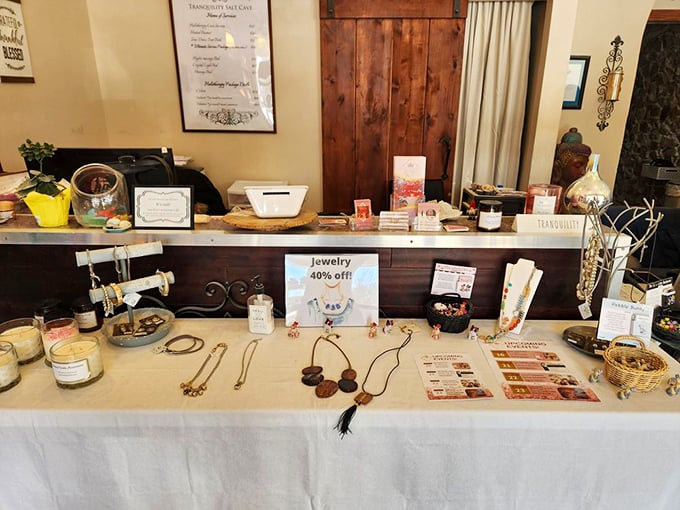 The front desk area welcomes you with warm lighting and an array of wellness products that extend the experience beyond your visit.