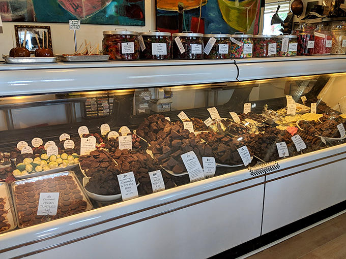 The display case offers a dazzling array of treats that make choosing just one nearly impossible.