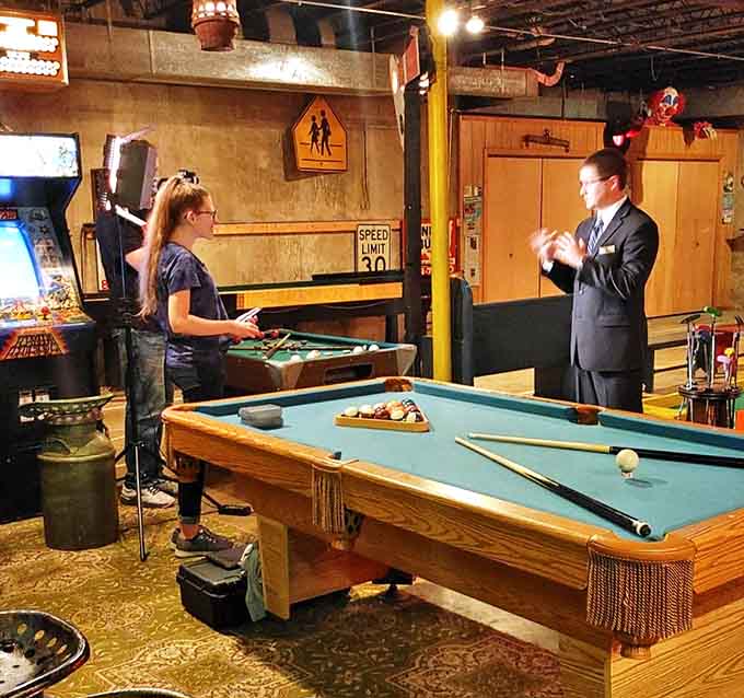 Between rounds of mini-golf, challenge your friends to billiards because apparently one game wasn't enough entertainment for this space.