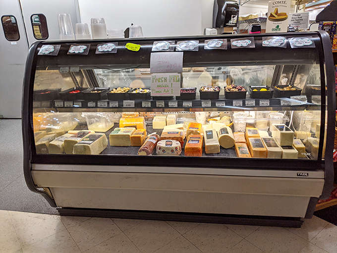 The cheese counter stands as a dairy lover's dream, offering a world tour of flavors without the hassle of passport control.
