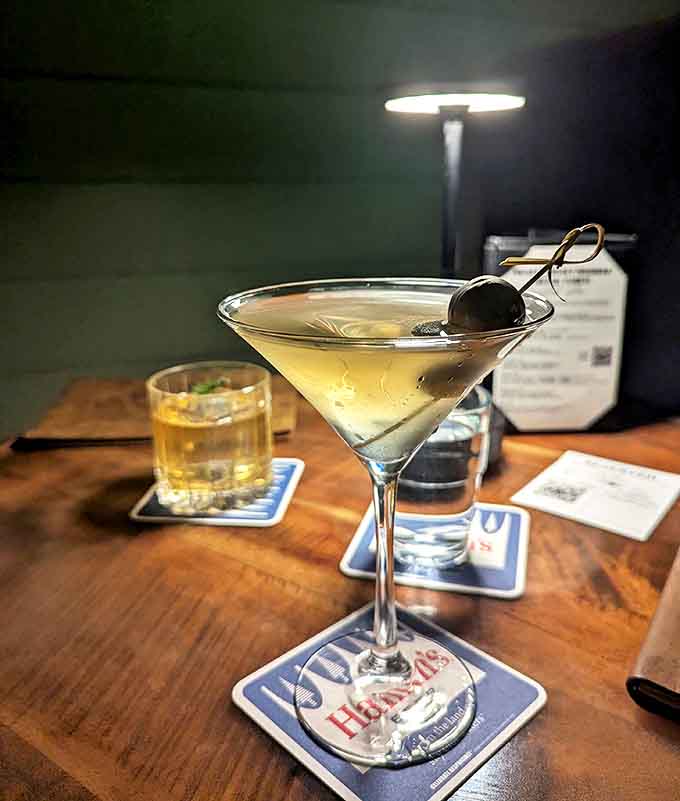 The perfect martini awaits &ndash; Crystal clear and perfectly chilled, this classic cocktail sits elegantly in its proper glass, garnished with care and ready for sipping.