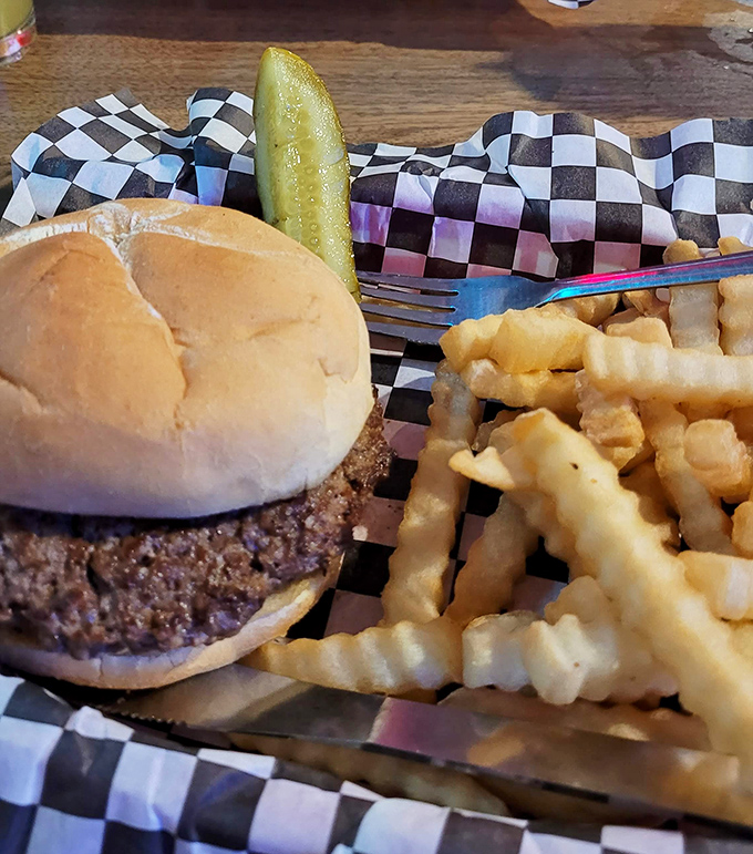 The classic cheeseburger and fries combo, proving sometimes the simplest things are the most satisfying.