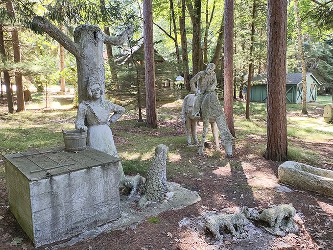 Country life captured in concrete &ndash; this farmyard scene tells stories of simpler times, the figures frozen in their daily chores.