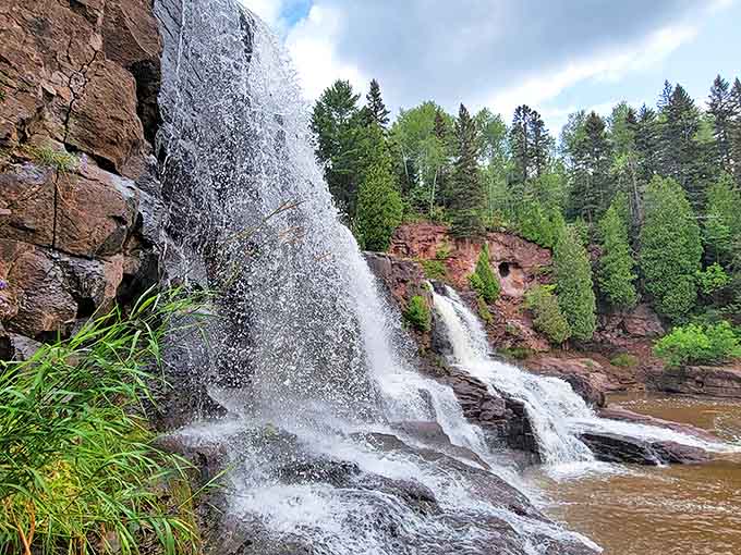 The hypnotic flow of water over ancient volcanic rock creates patterns that could inspire artists and daydreamers for hours.