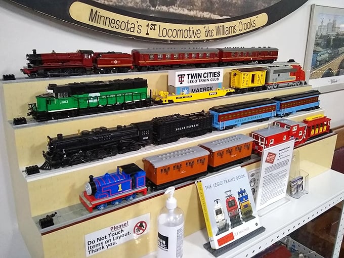 Young train enthusiasts can't resist the interactive displays where pressing buttons brings the miniature world to life.