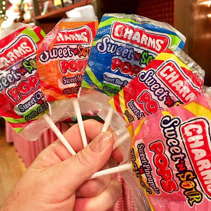 Charms Sweet and Sour Pops line up like colorful sentinels, guarding the perfect balance between pucker and pleasure.