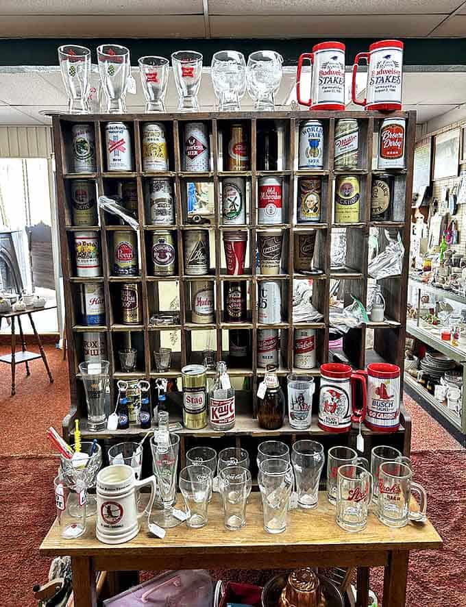 Vintage beer steins, glasses, and cans demonstrate Popeye's merchandising reach, proving the sailor's face sold everything from beverages to breakfast cereal.