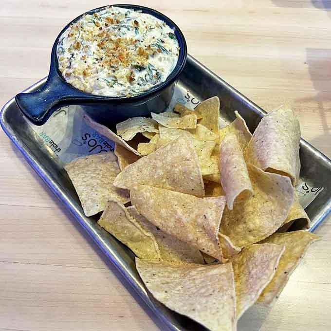 Loaded nachos that demand to be shared, though you'll be tempted to keep them all to yourself.