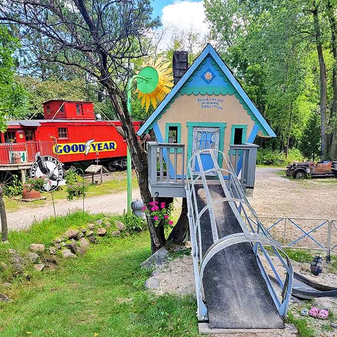 Childhood wonder gets an architectural upgrade with this whimsical blue playhouse, complete with sunshine vibes and a slippery escape route.