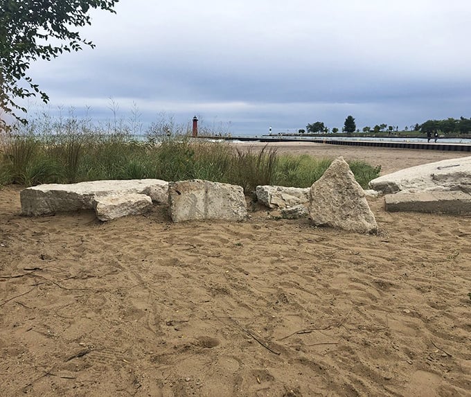 Soft sand, calm skies, and the lighthouse peeking through&mdash;Simmons Island Beach is the perfect place to breathe, wander, and unwind today.