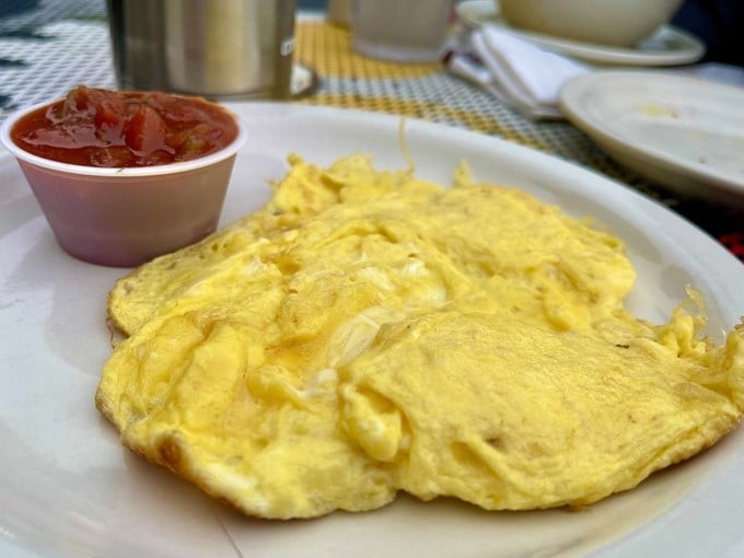These aren't just any eggs &ndash; they're the kind that make you question why eggs at home never turn out this gloriously yellow and fluffy.